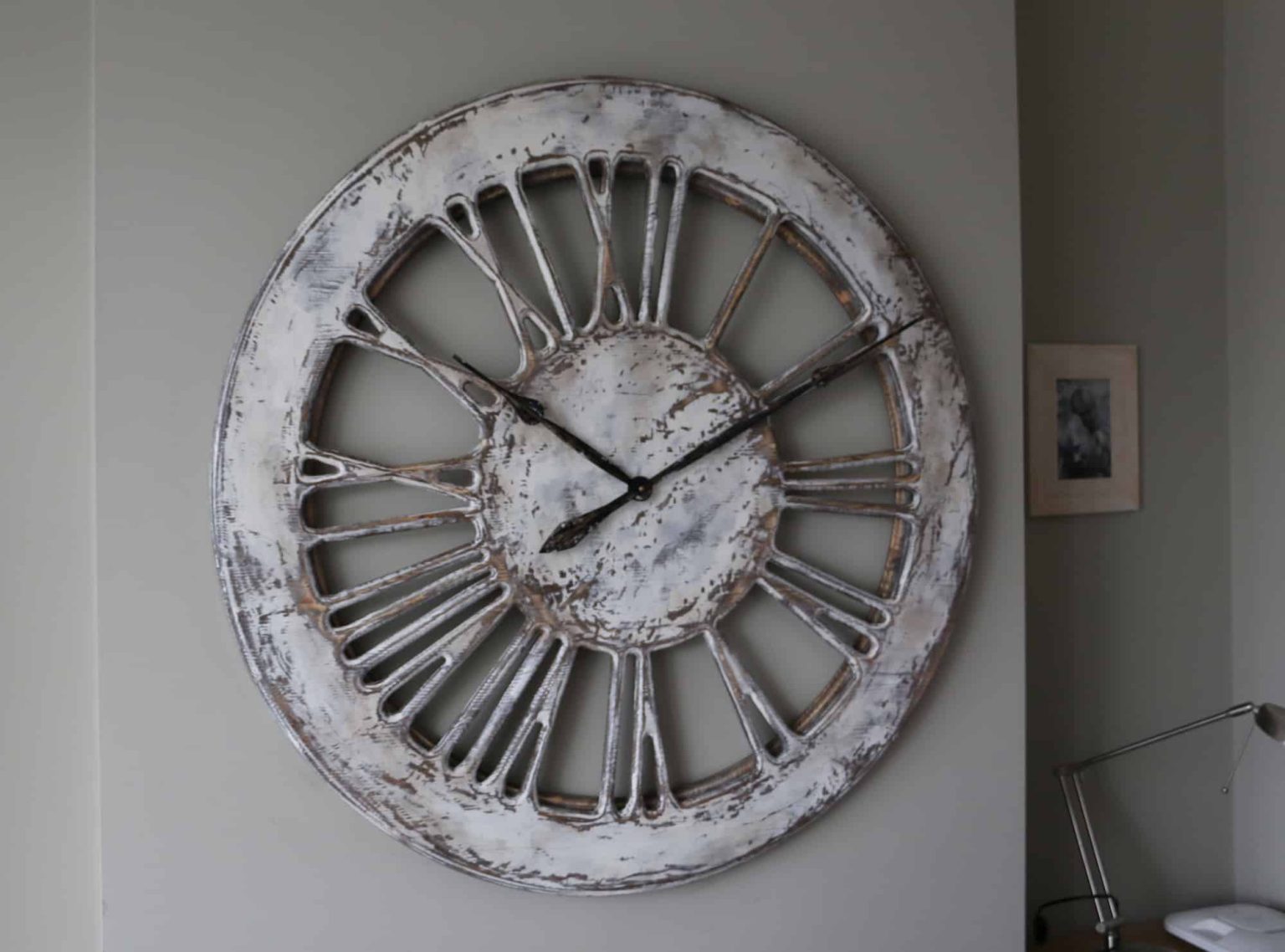White Skeleton Wall Clock With Large Wooden Roman Numerals